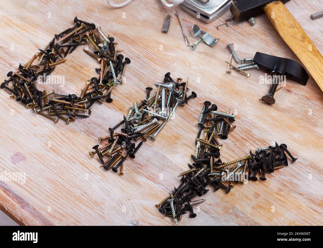 Screws formed word DIY on wooden table Stock Photo - Alamy