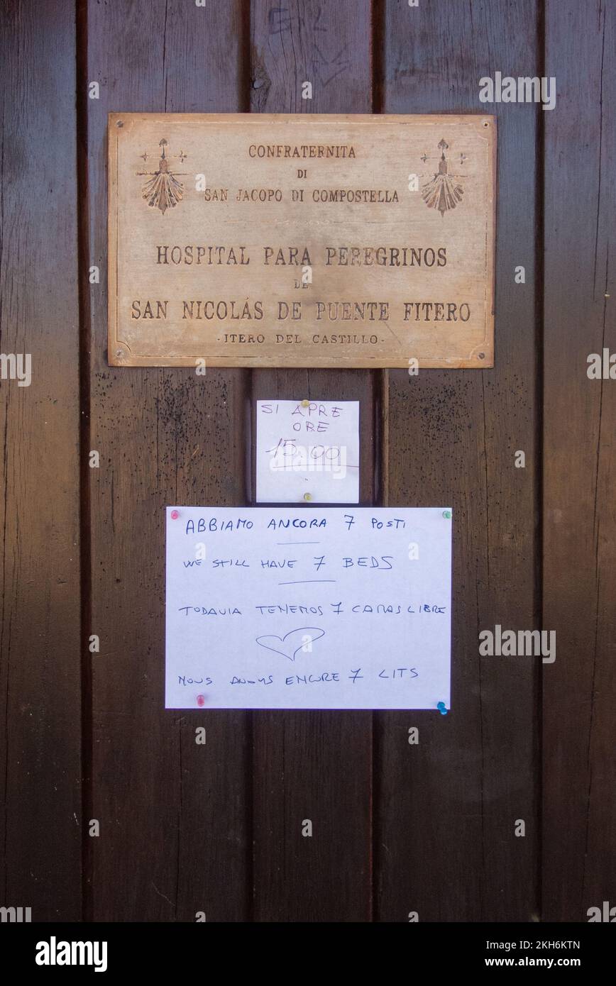 Notes at the door of the pilgrim's hostel in the medieval chapel of San ...