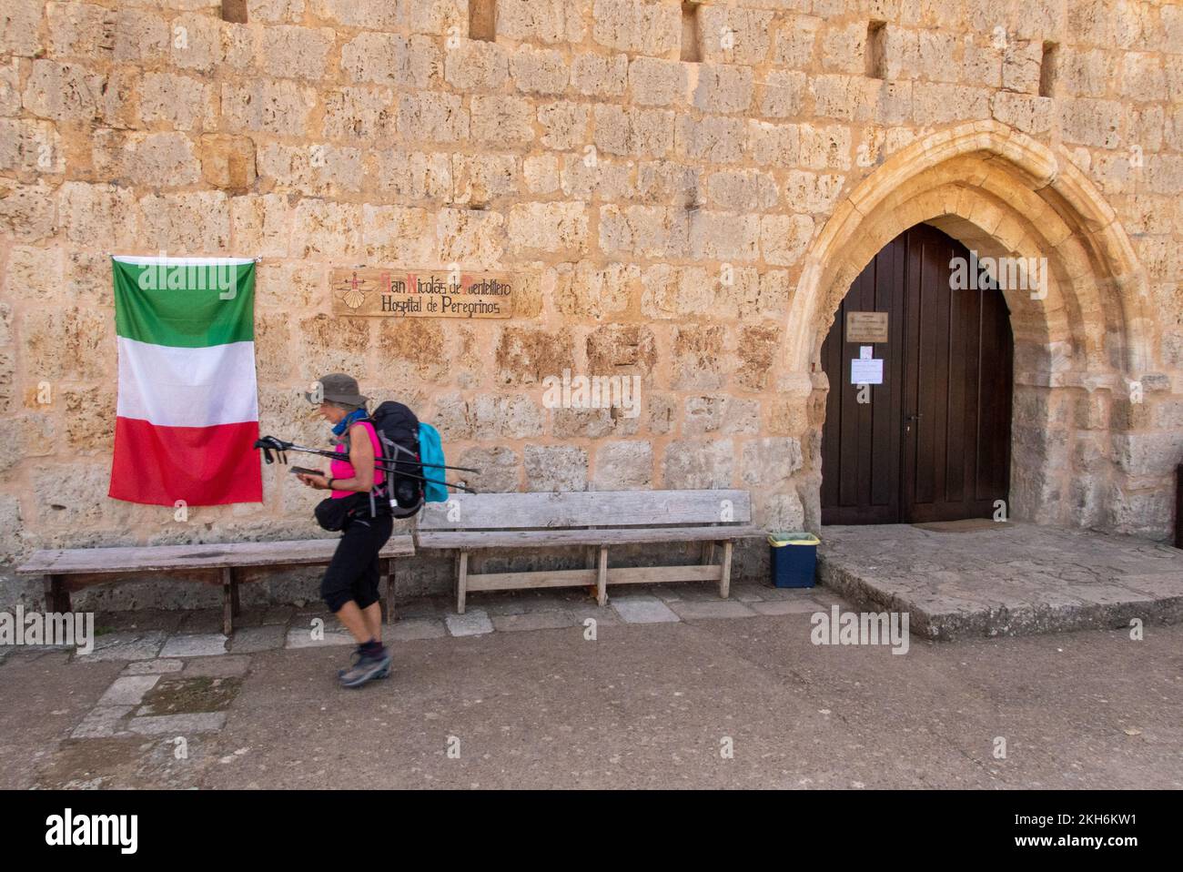 A pilgrim at the hostel in the medieval chapel San Nicolás, dating from ...