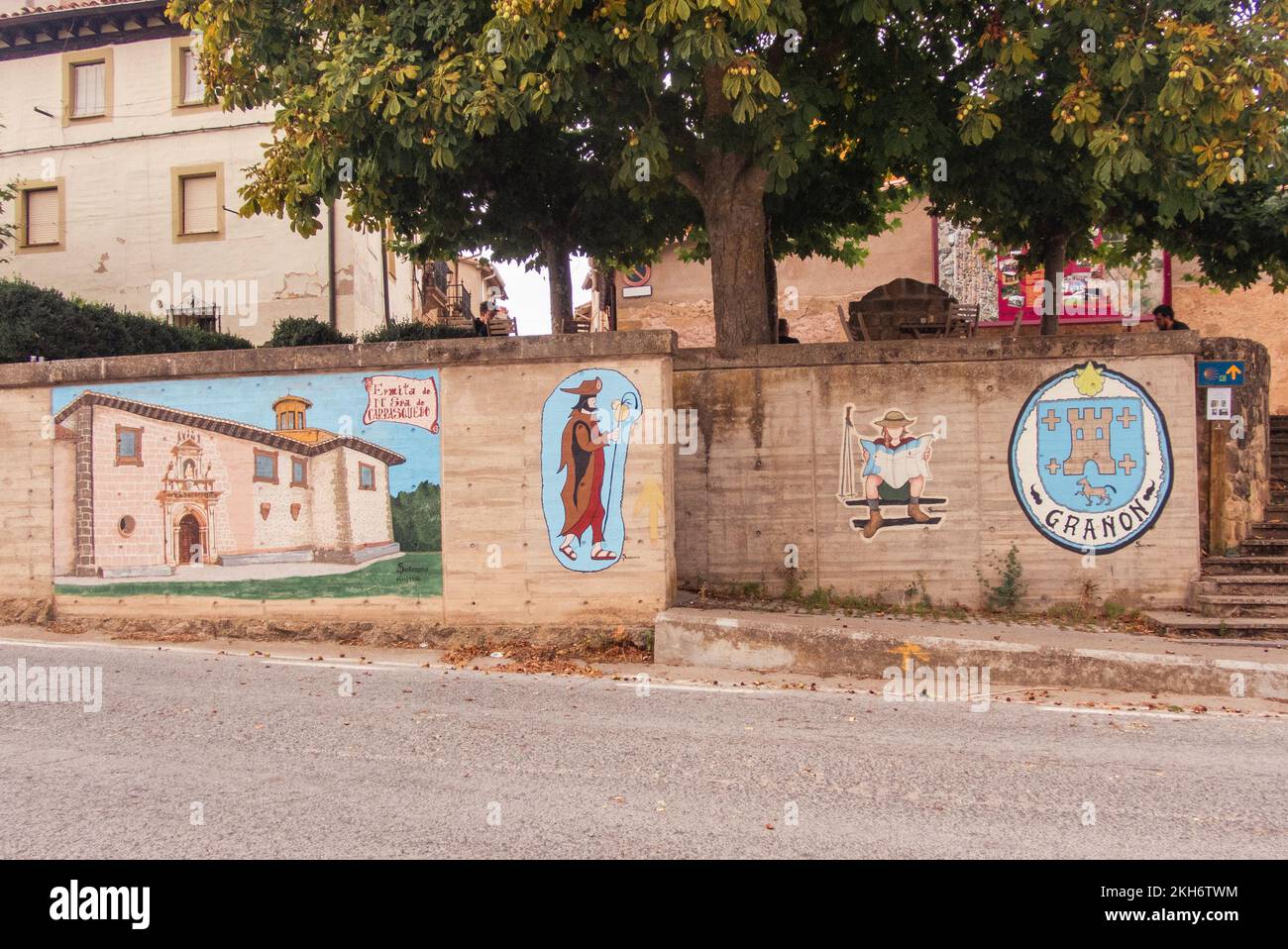 Wall paintings in comic style near the pilgrim's hostel in the village ...