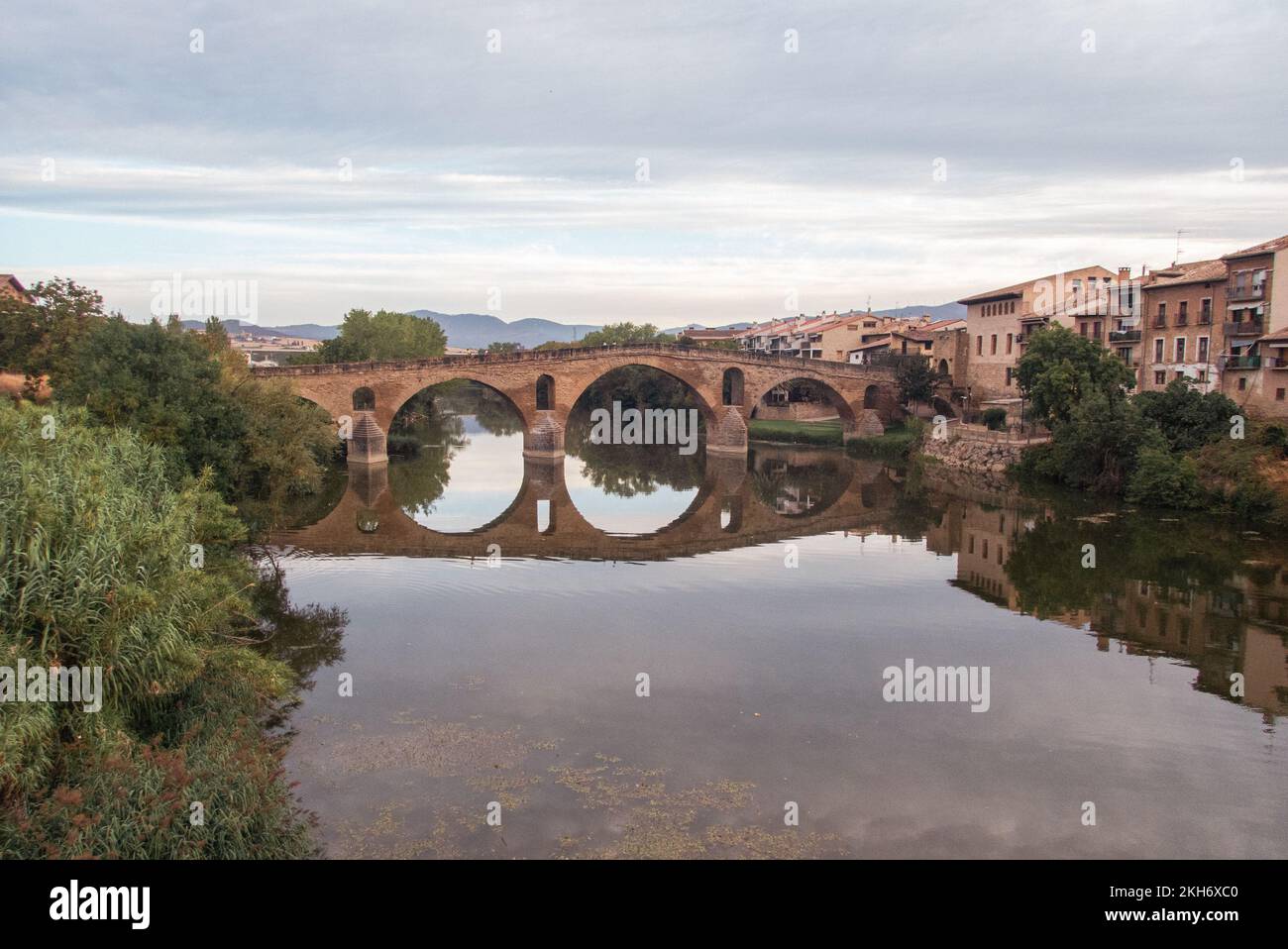 The important bridge across the river Arga, build in medieval times at ...