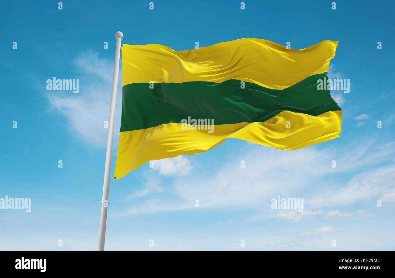 official flag of Isabela untied states of America at cloudy sky ...