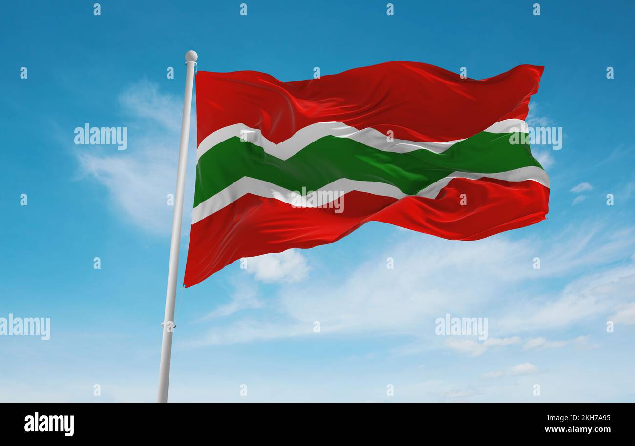 official flag of Jayuya untied states of America at cloudy sky ...