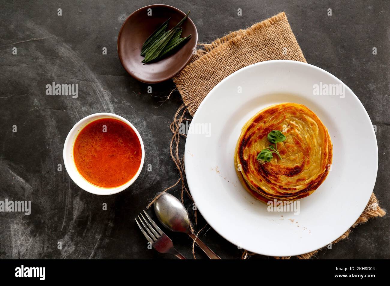 paratha bread or canai bread or roti maryam, favorite breakfast dish ...