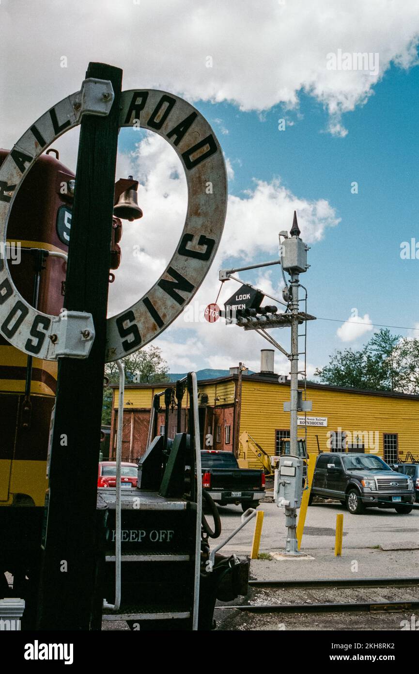 A classic railroad crossing at the Conway Scenic Railway station. North ...