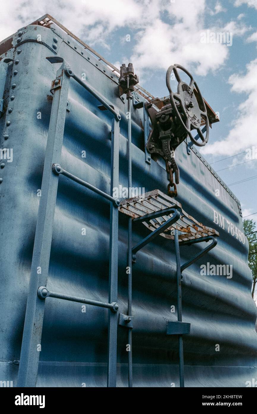A blue boxcar and blue sky at the Conway Scenic Railway station. North ...