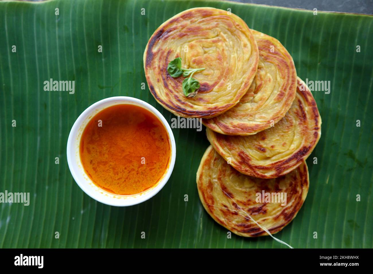 paratha bread or canai bread or roti maryam, favorite breakfast dish ...