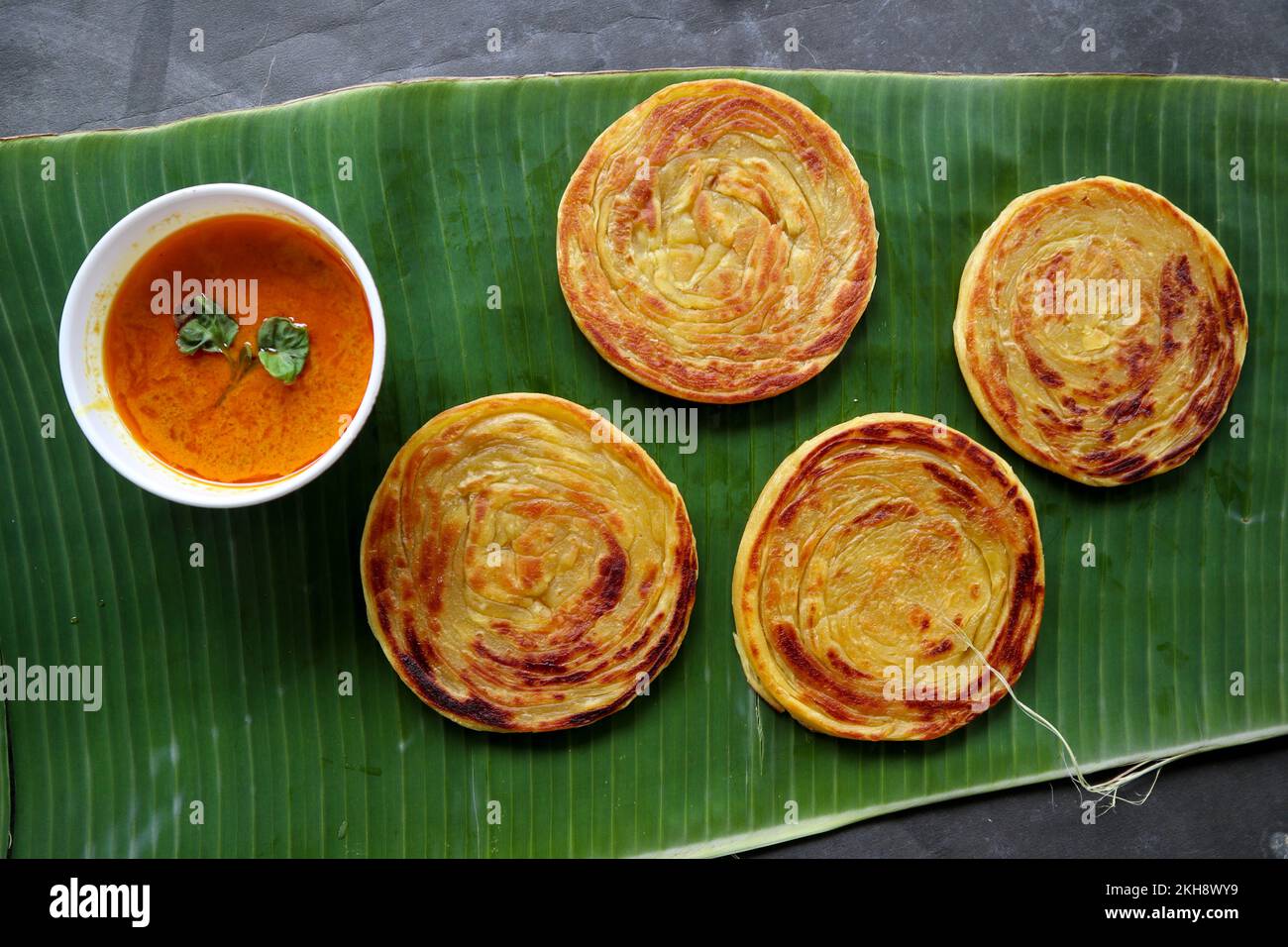 paratha bread or canai bread or roti maryam, favorite breakfast dish ...