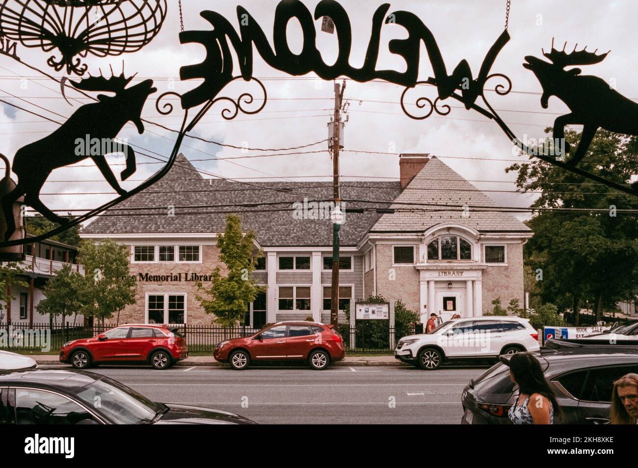 The entrance to a metal sculpture and gift shop with a sign reading ...