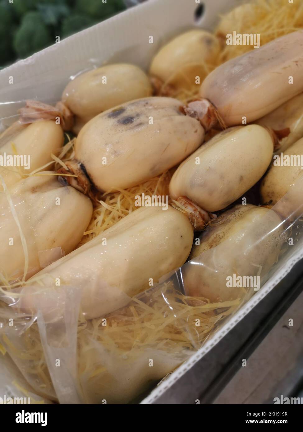 a box of fresh white lotus rhizome roots vegetable Stock Photo - Alamy