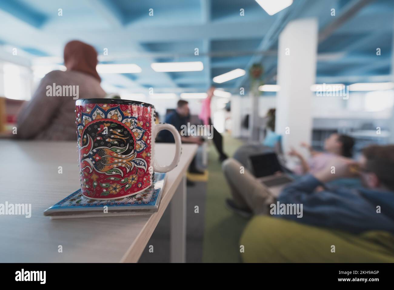 Multiethnic startup business team on meeting in a modern bright open ...