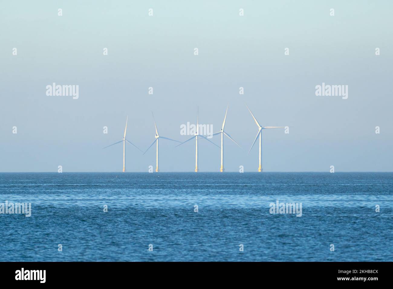 A beautiful view of Wind turbines of an offshore windfarm Stock Photo ...