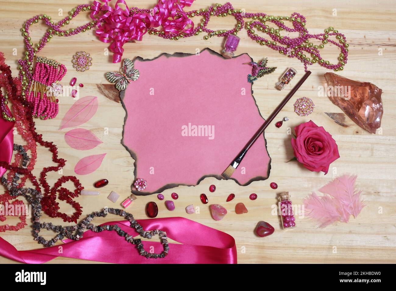 Pink and Magenta Jewelry With Flower and Paint Brush and Blank Paper ...