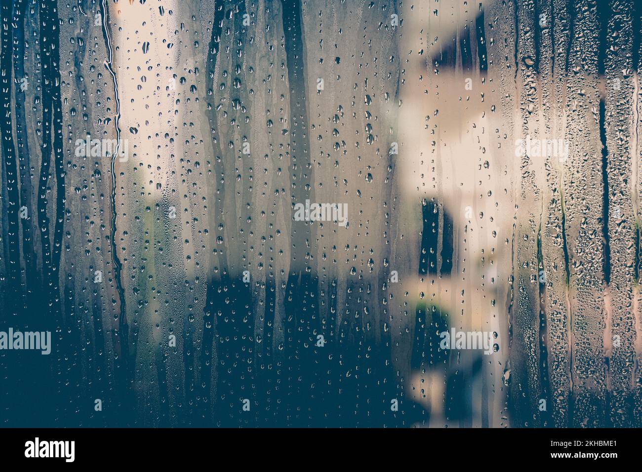 Water drop on the glass of windows background Stock Photo - Alamy
