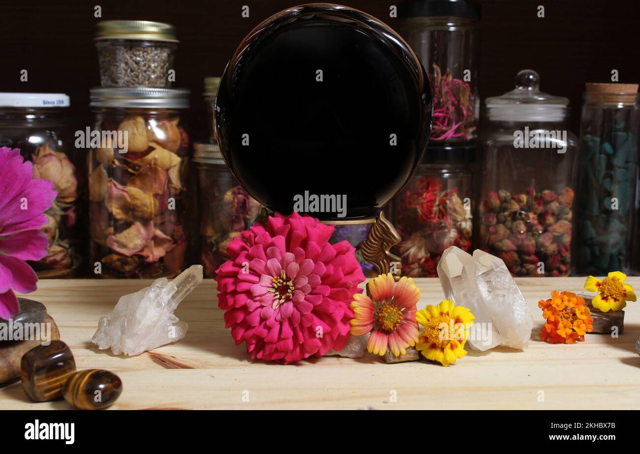 Meditation Altar With Rock Crystals and Flowers. Large Obsidian Crystal ...