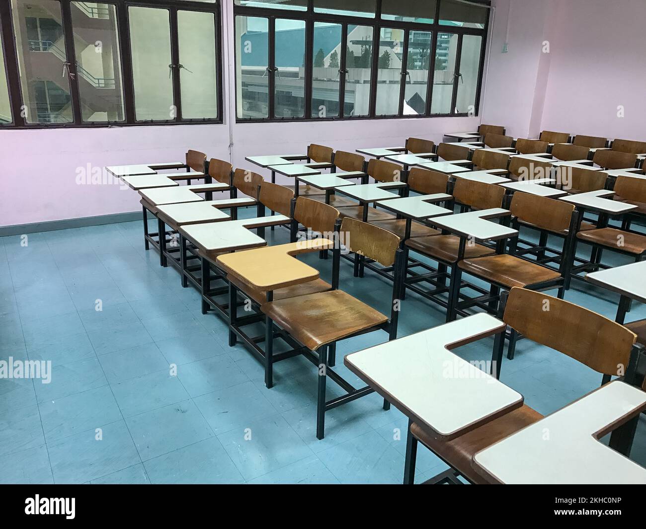 Wooden chairs in the classroom background Stock Photo - Alamy