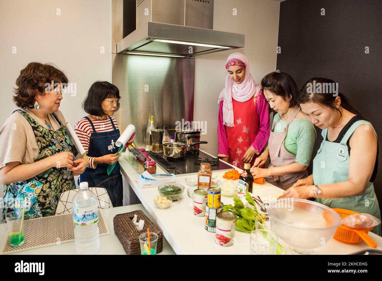 Teacher instructs at Tunisian cooking class, Shibaura, Tokyo, Japan ...