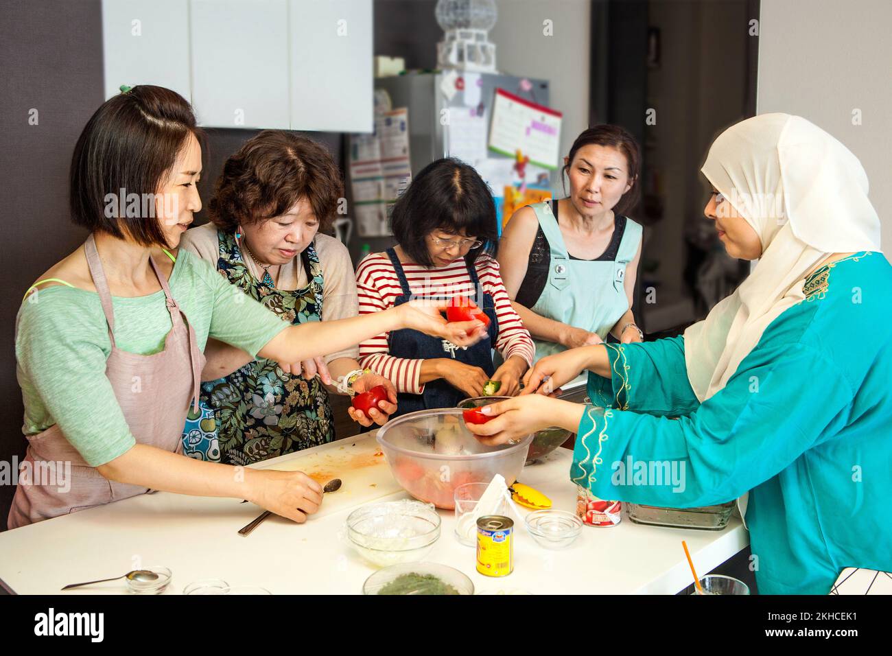 Teacher instructs at Tunisian cooking class, Shibaura, Tokyo, Japan ...
