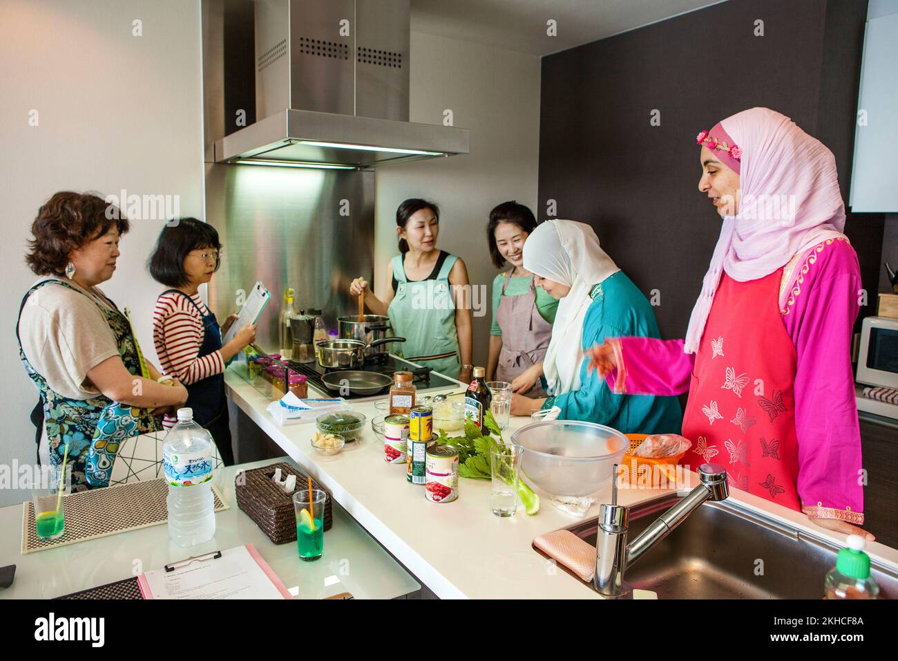 Teachers instruct at Tunisian cooking class, Shibaura, Tokyo, Japan ...