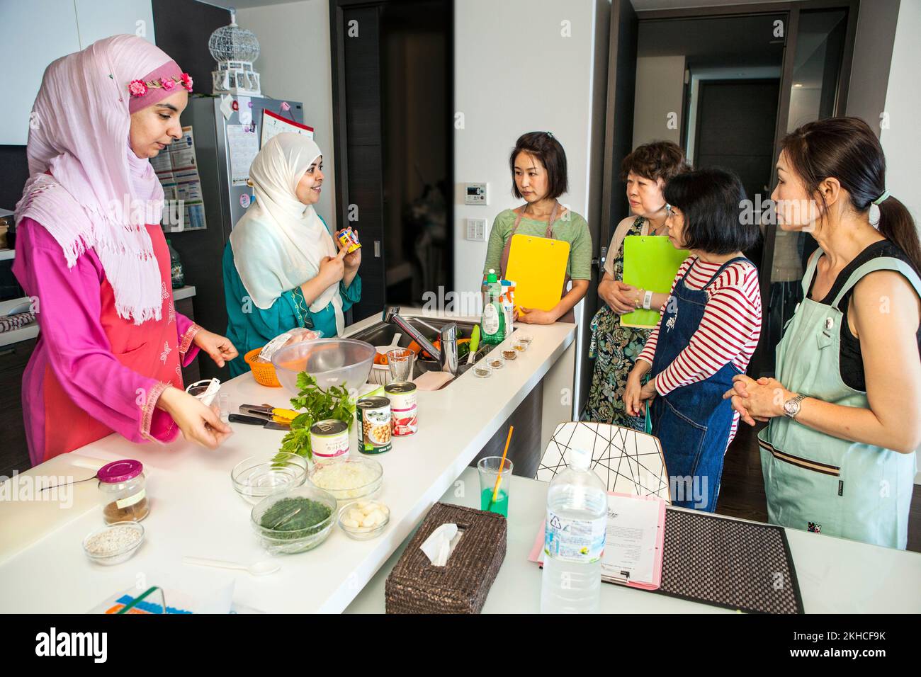 Teachers instruct at Tunisian cooking class, Shibaura, Tokyo, Japan ...