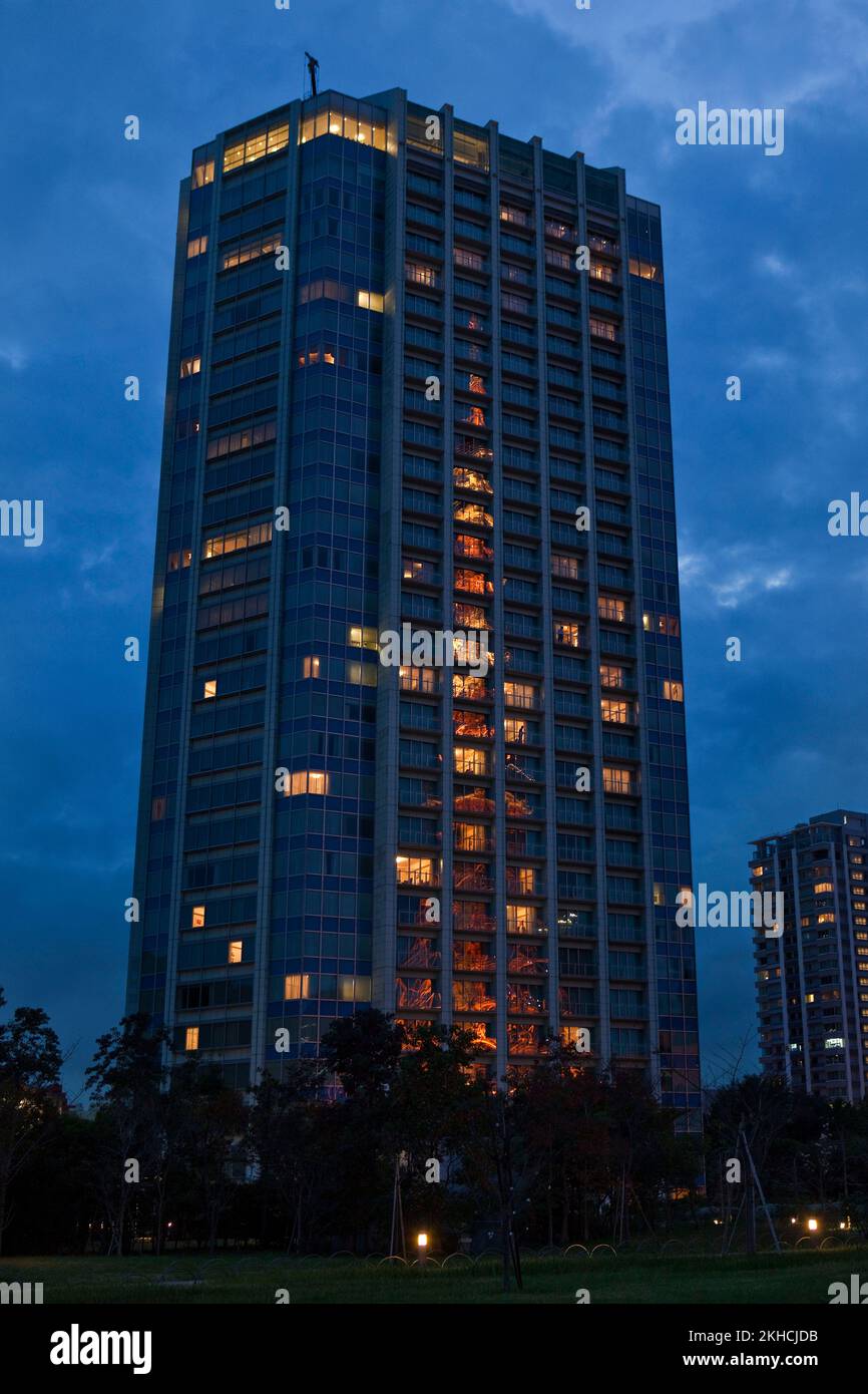 Tokyo Tower reflected in the nearby building windows at dusk in Tokyo, Japan Stock Photo - Alamy