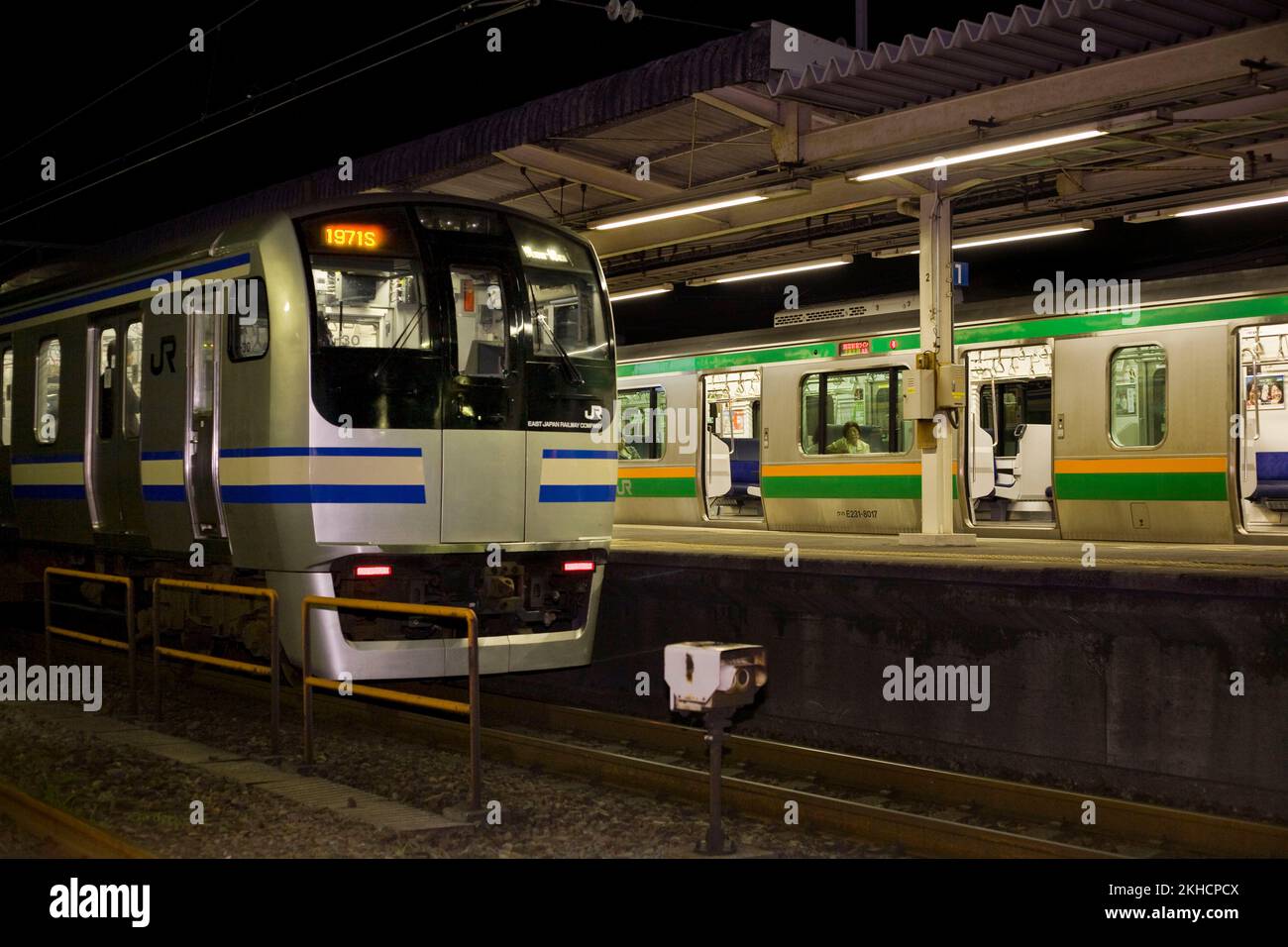 Trains in station evening Kamakura Japan Stock Photo - Alamy