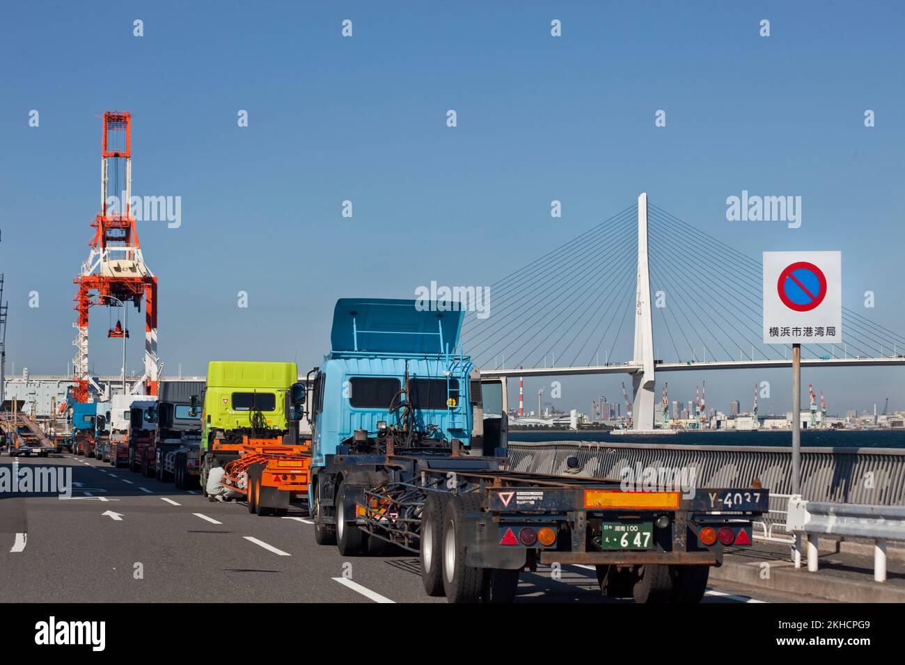 Trucks to load containers port Yokohama Japan H Stock Photo - Alamy