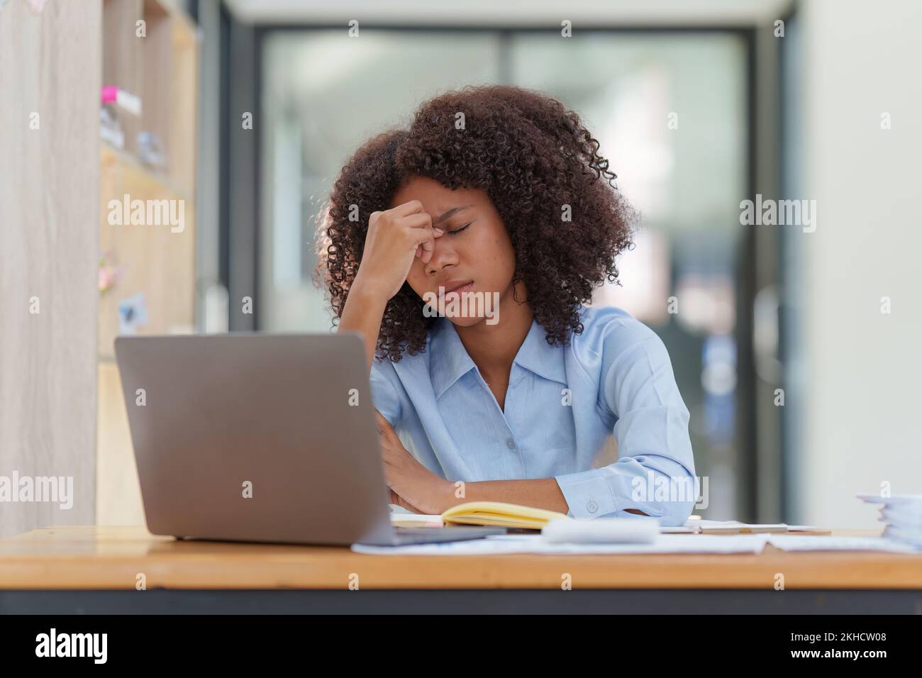 Portrait thoughtful confused young african american businesswoman ...