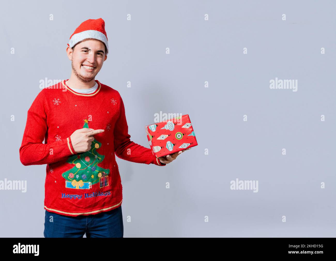 Pointing at gift hi-res stock photography and images - Alamy