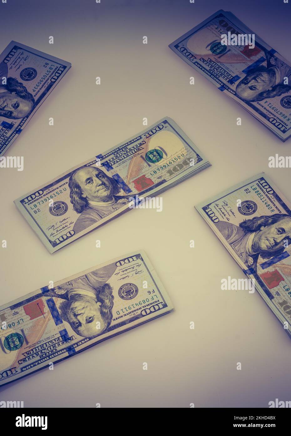 American 100 dollar banknote bundles placed on white background Stock ...