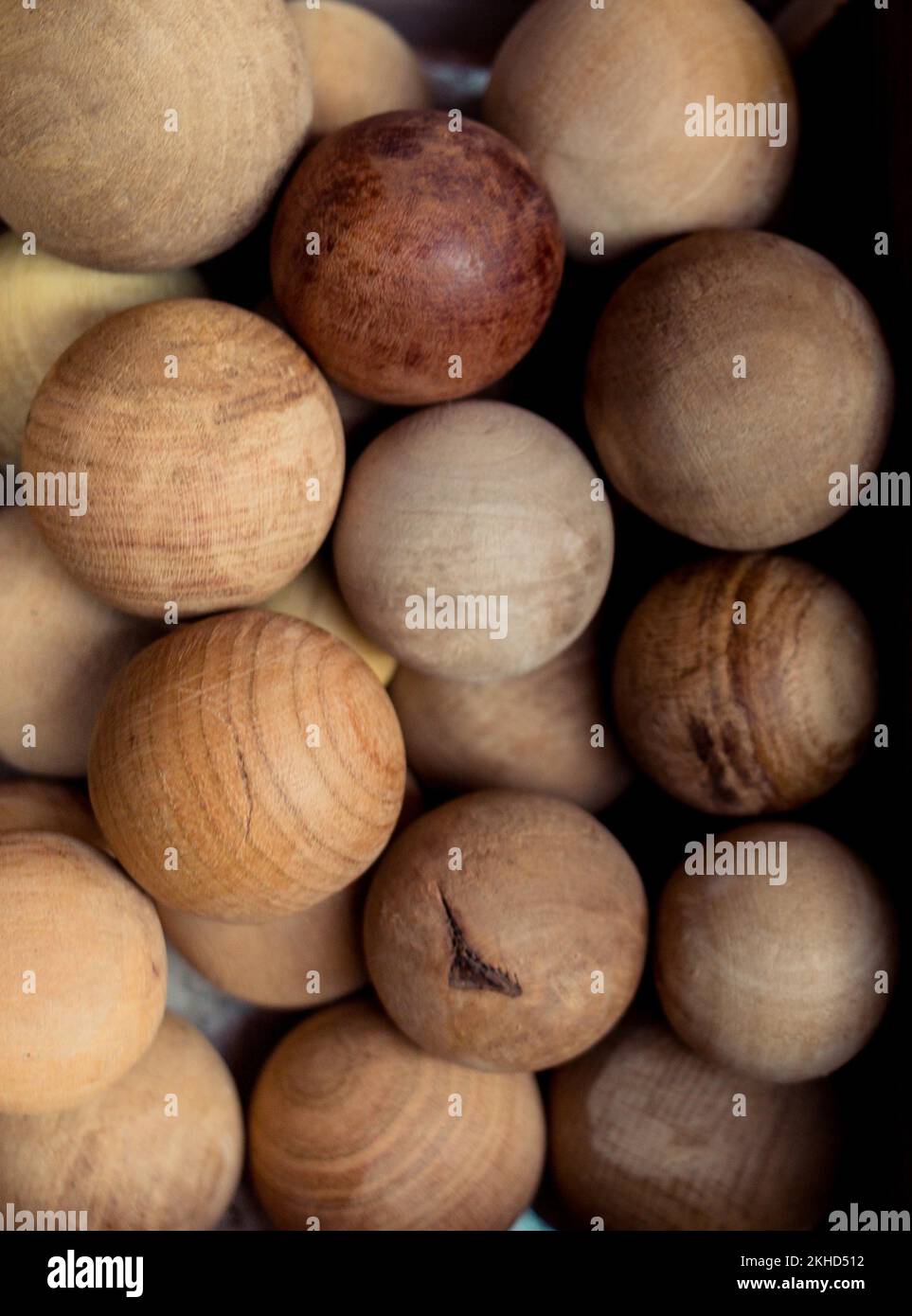 Plenty of wooden balls of light brown color Stock Photo - Alamy