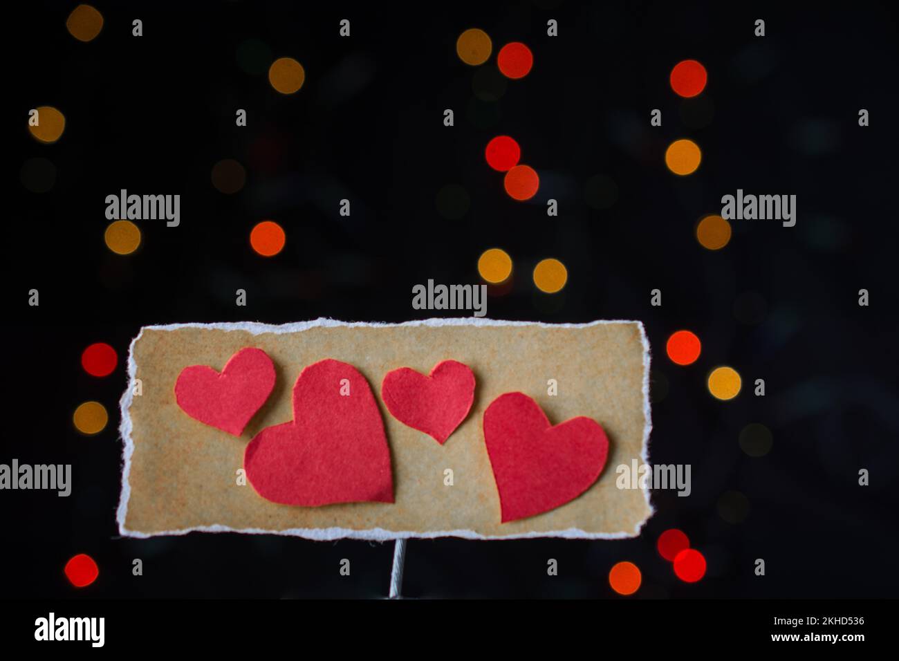 Valentine's day wording on torn paper as Love concept Stock Photo - Alamy