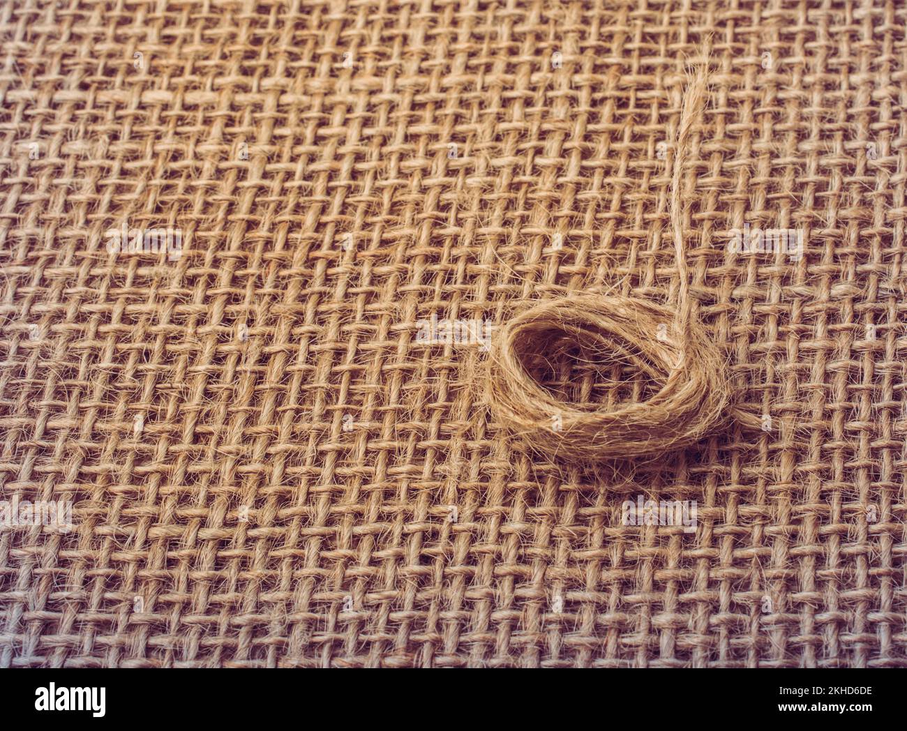 Roll of brown color linen string paper background Stock Photo - Alamy