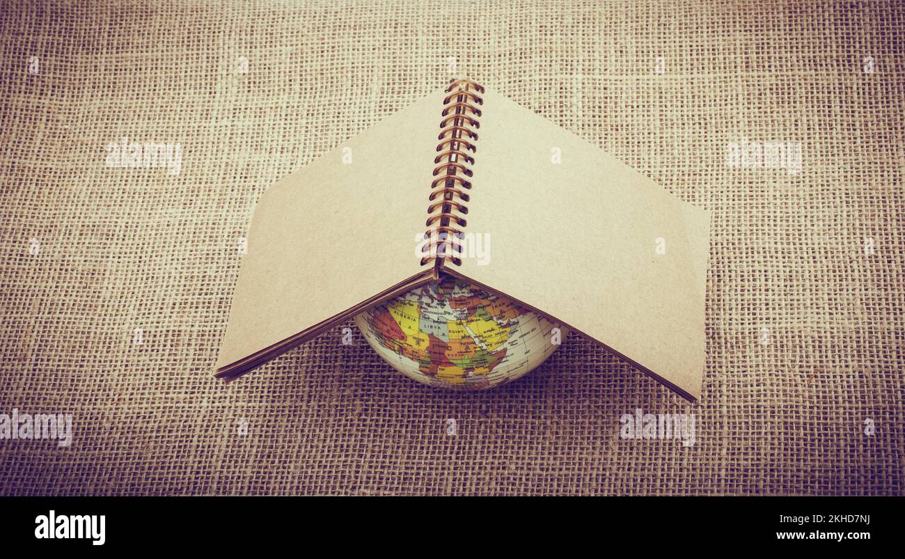 Globe is placed on canvas background Stock Photo - Alamy