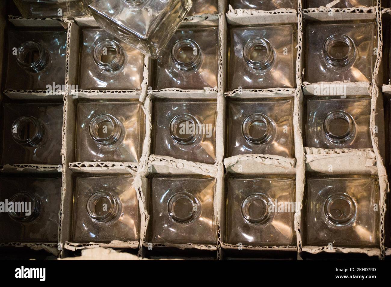 Set of Empty small transparent bottles in a box Stock Photo - Alamy