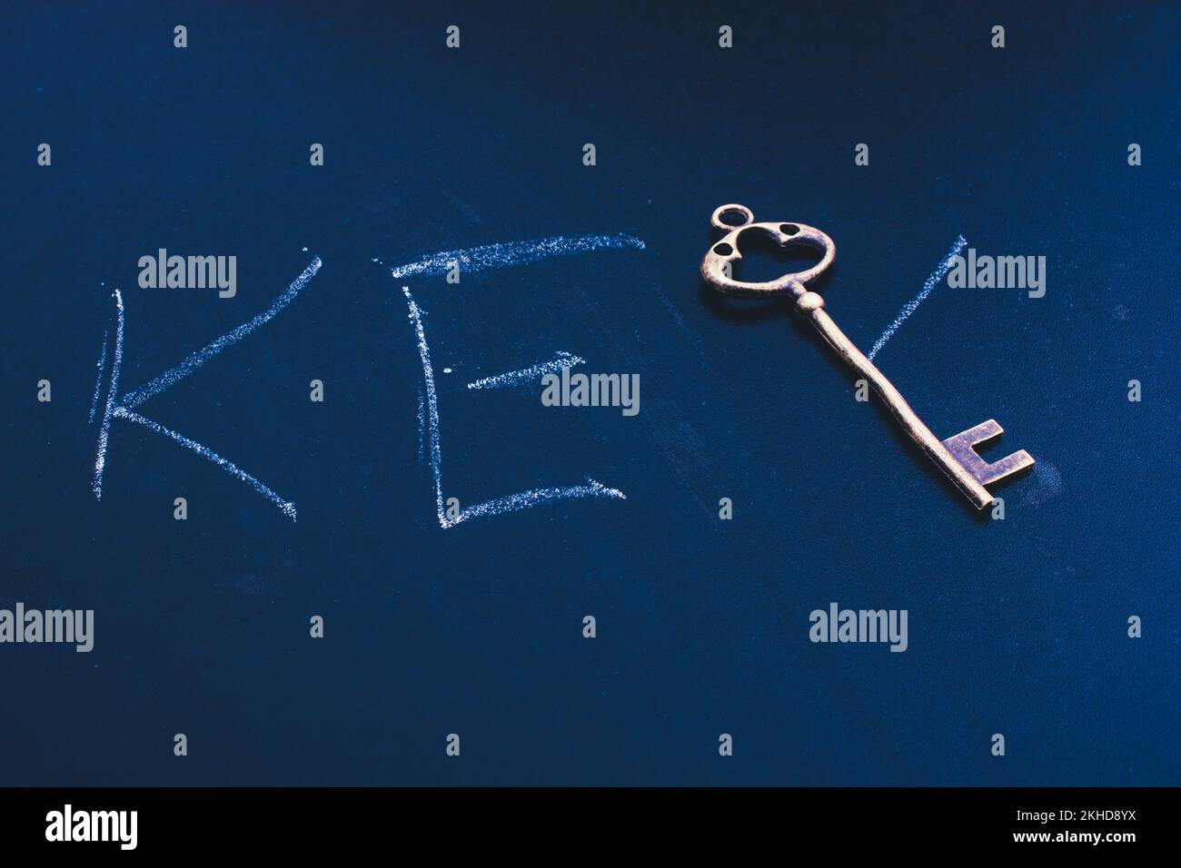 Retro styled golden color key forms the word key Stock Photo - Alamy