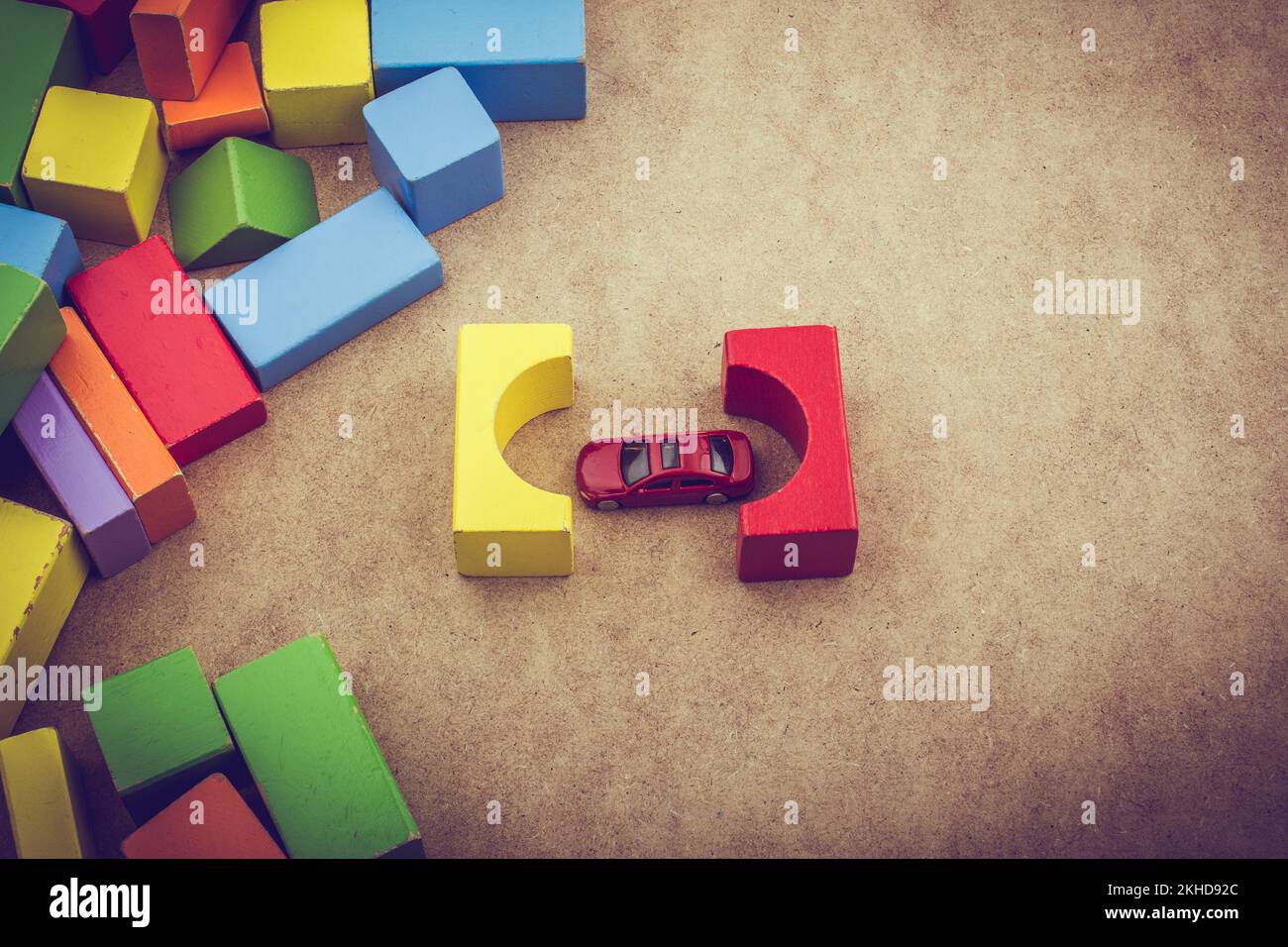 Building blocks and a toy car as a transportation devices Stock Photo ...