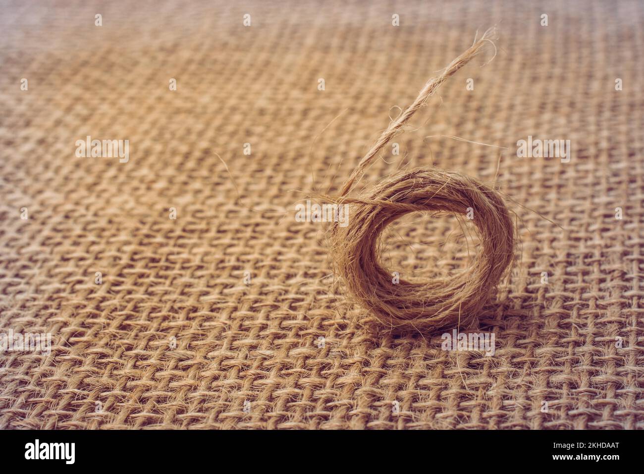 Roll of brown color linen string paper background Stock Photo - Alamy