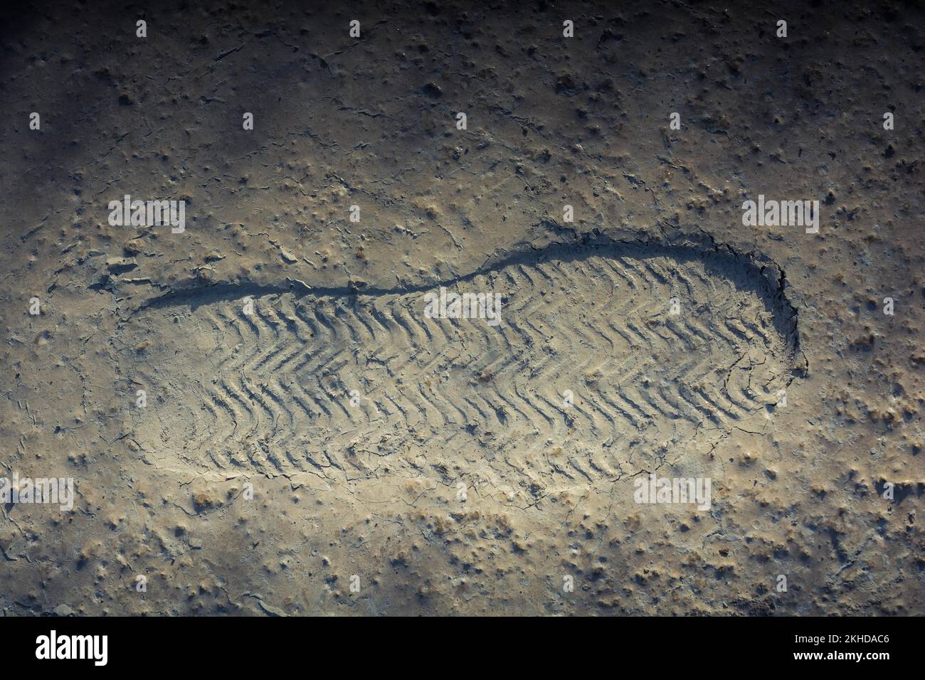 Footstep pattern seen on a concrete background Stock Photo - Alamy