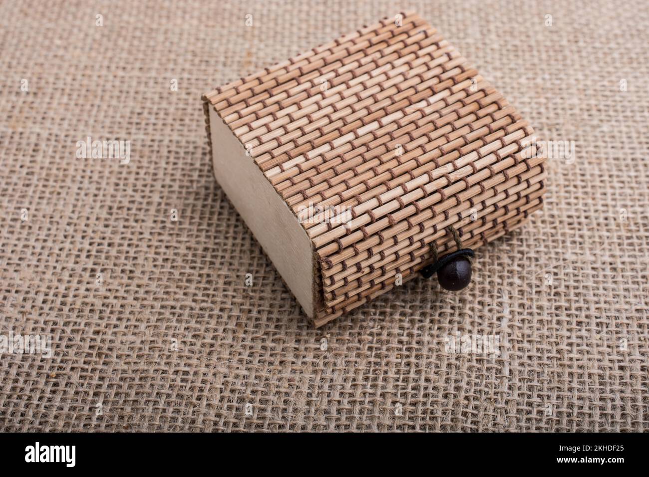 Little Straw wooden box of light brown color Stock Photo - Alamy