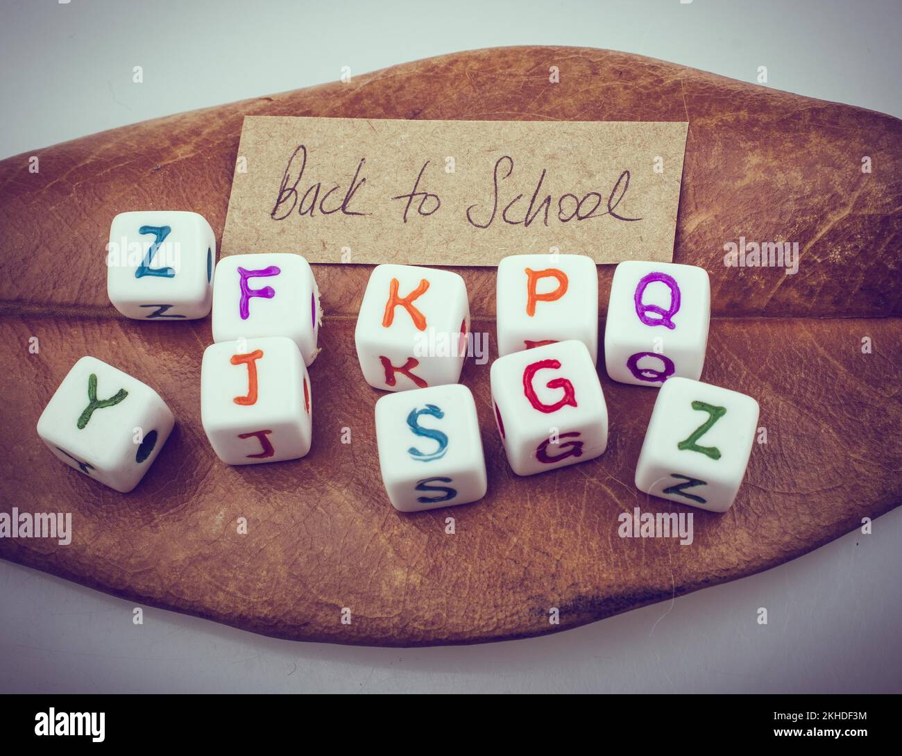 Back to school theme with colorful letter cubes Stock Photo - Alamy