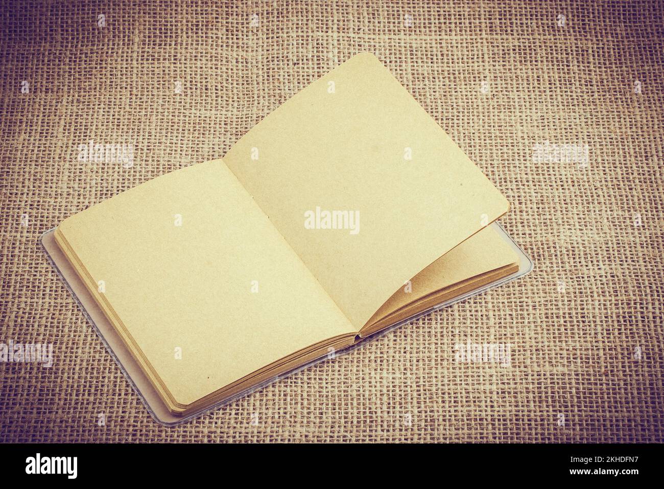 Pencil and notebook with a chain in the middle on spiral notebooks ...