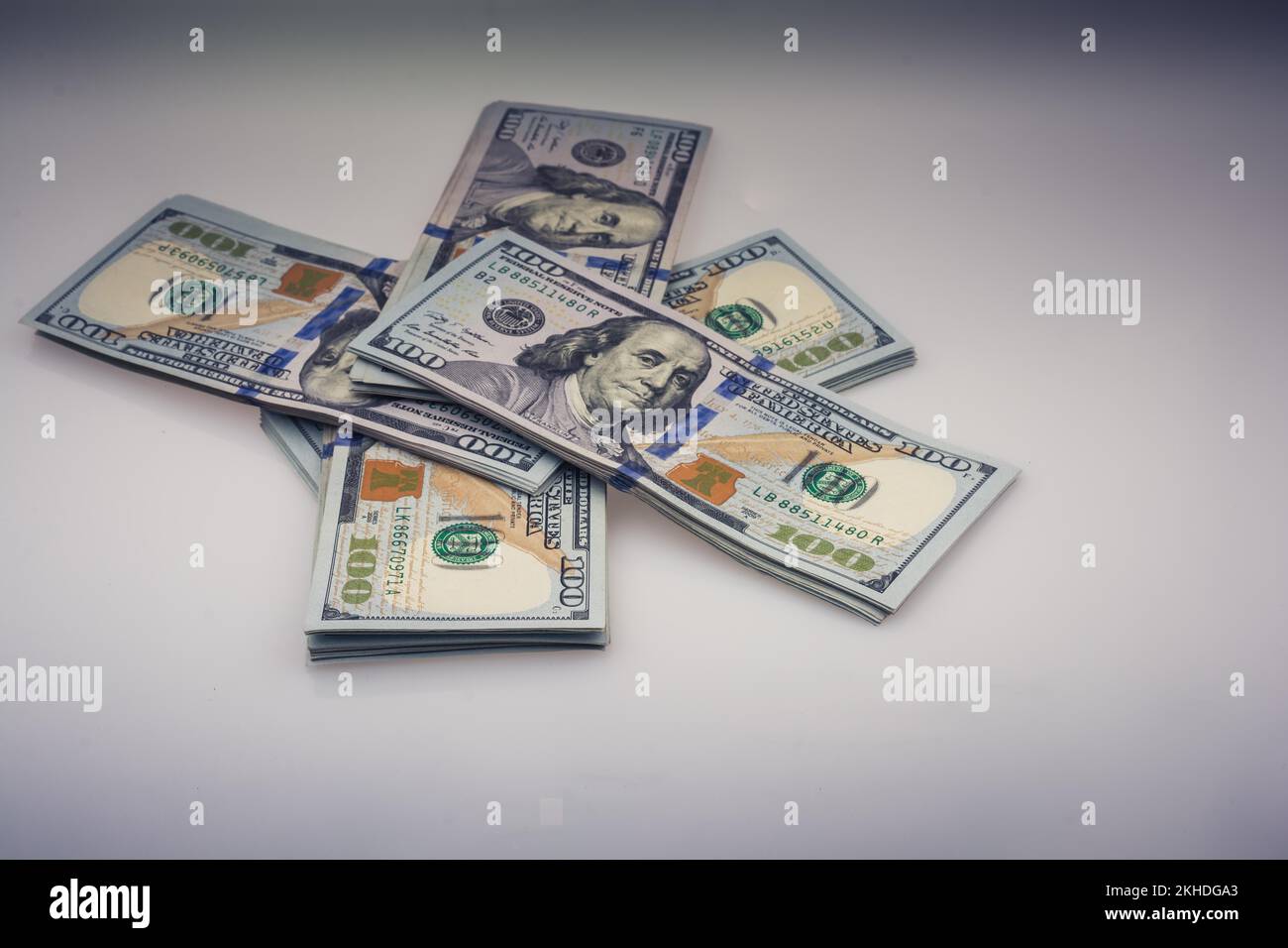 American 100 dollar banknote bundles placed on white background Stock ...