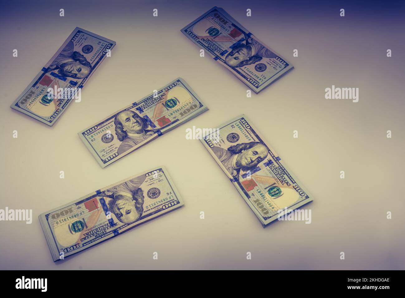 American 100 dollar banknote bundles placed on white background Stock ...