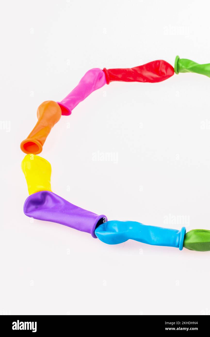 Little balloons of various color form a circle shape Stock Photo - Alamy