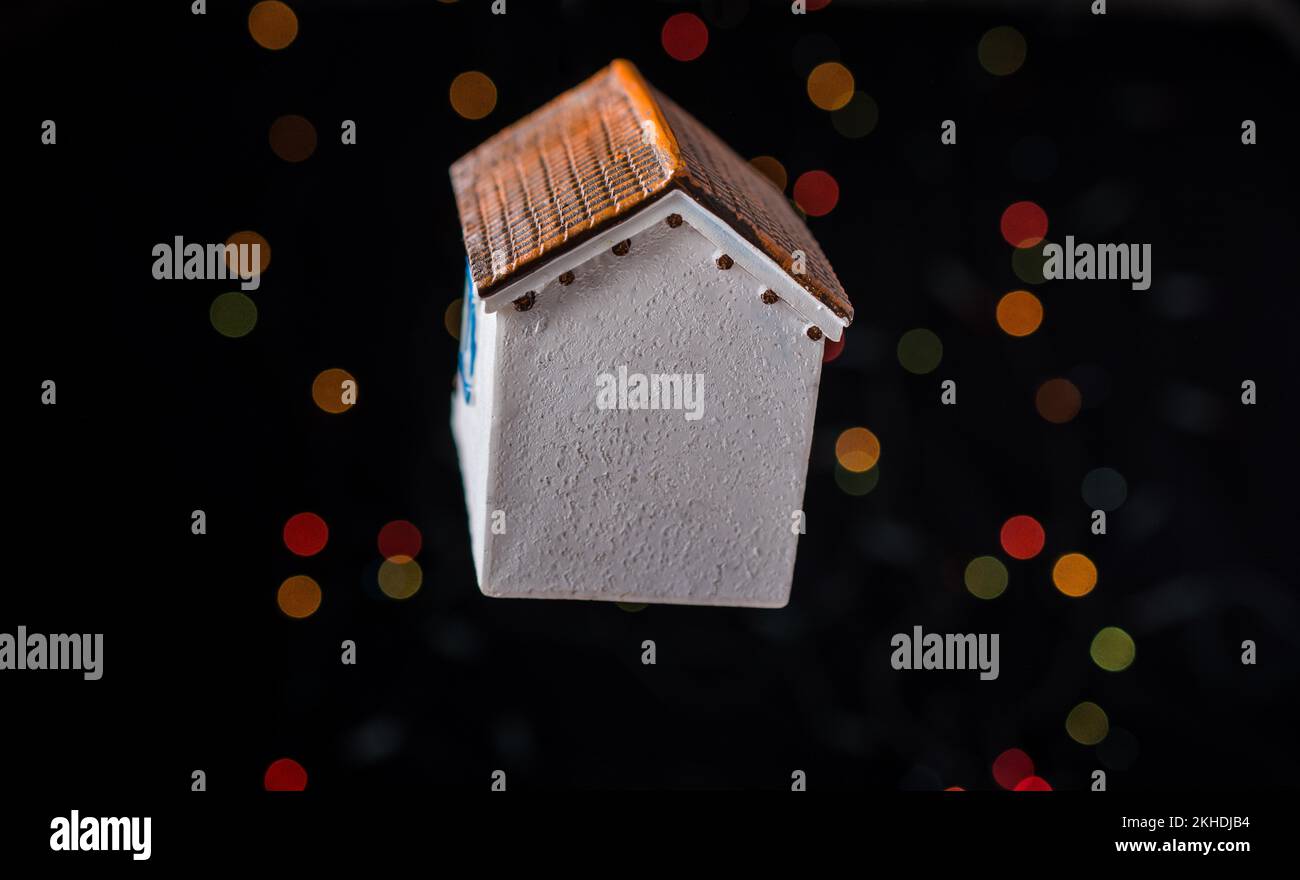 Little model house on a bokeh light background Stock Photo - Alamy