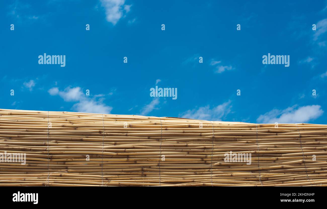 Mat made of straw used as a wall outdoors Stock Photo - Alamy