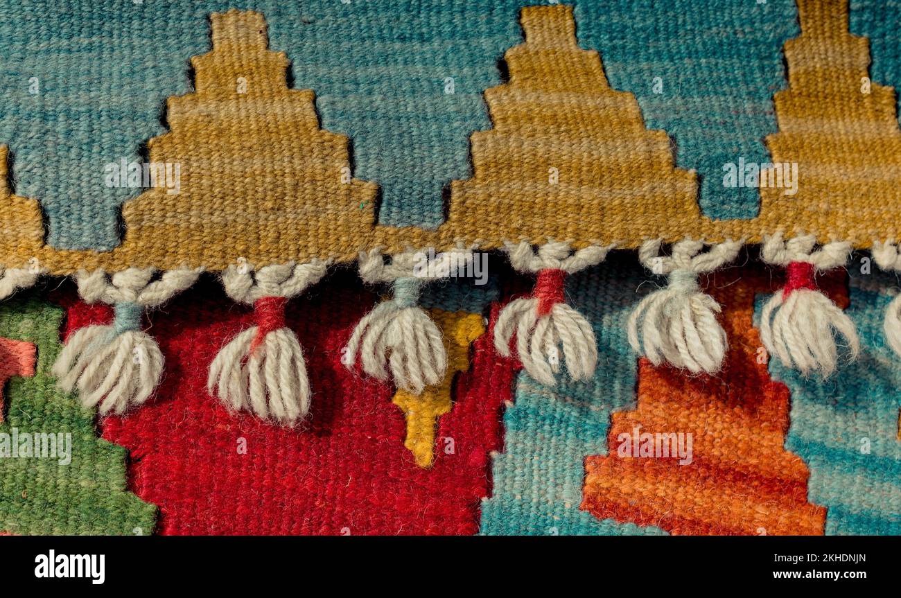 Old hand made carpet and rugs of traditional types Stock Photo - Alamy