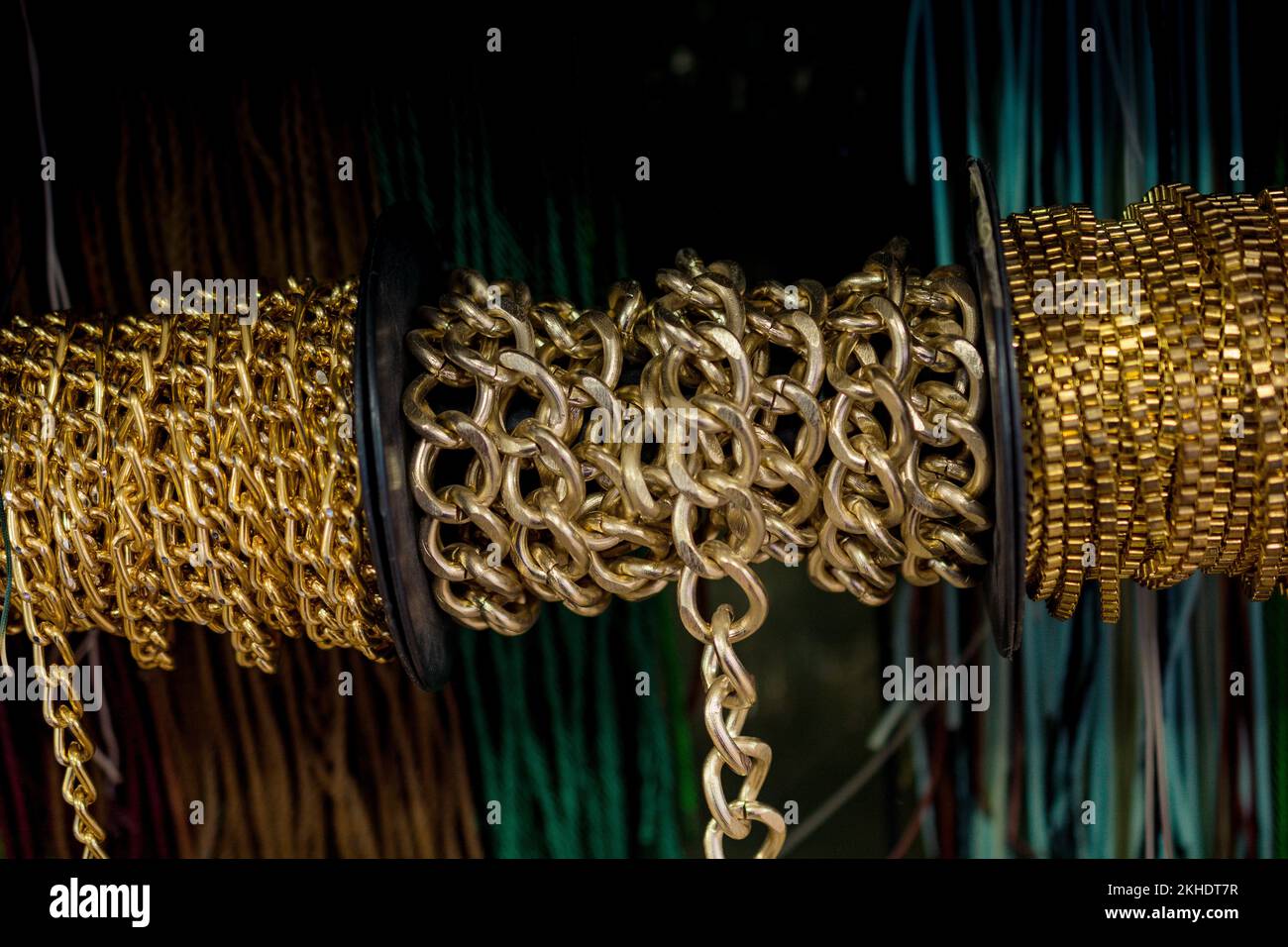 Rolls of metal chains as a background texture Stock Photo - Alamy