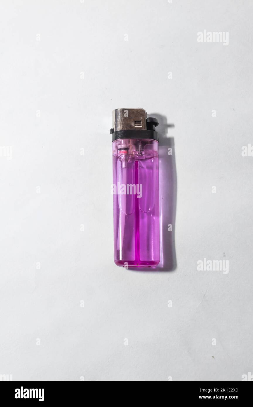 Purple lighter with white background for clipping Stock Photo - Alamy